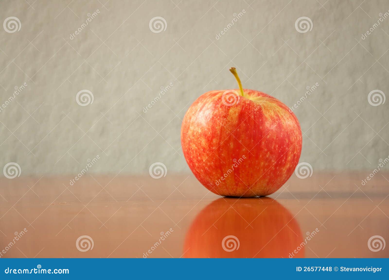 Red apple on table stock photo. Image of healthy, delicious - 26577448