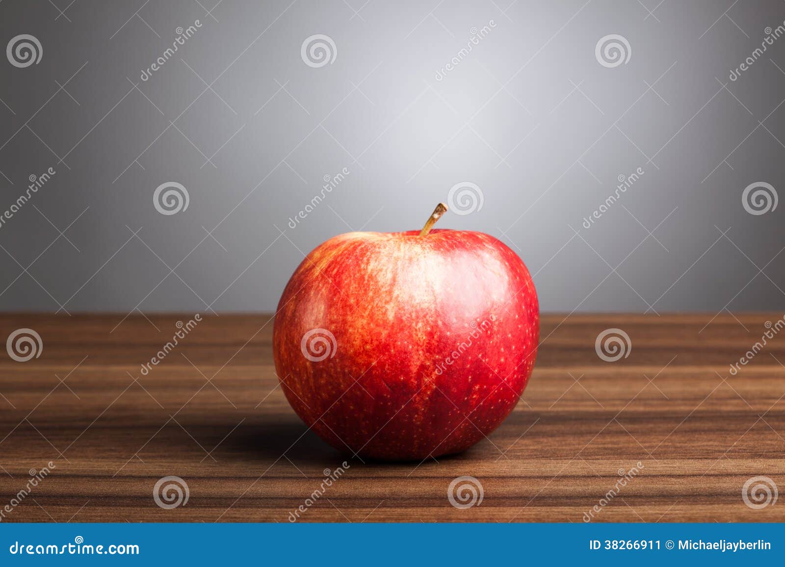 Red Apple on Table, Gray Background Stock Image - Image of background ...