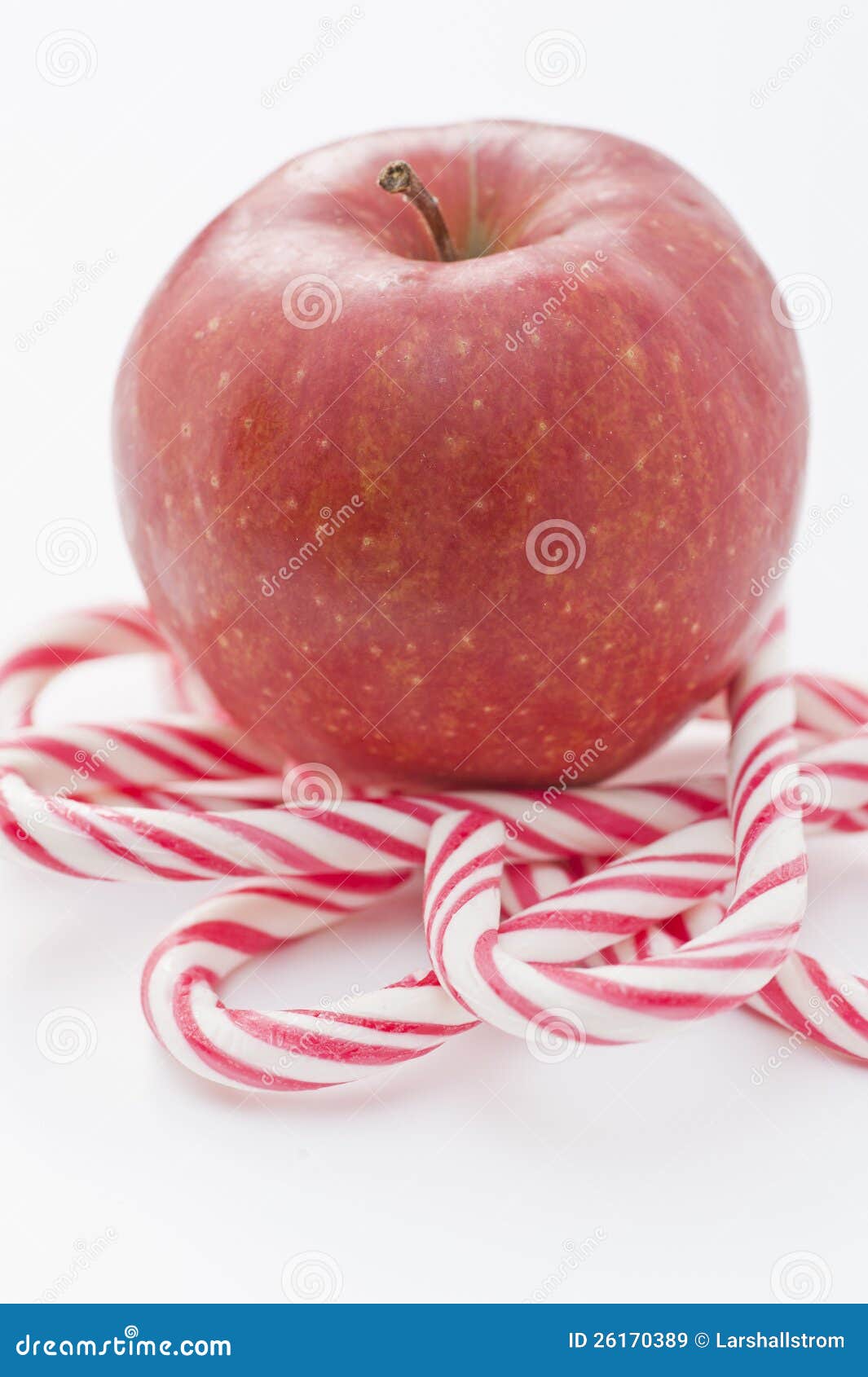 Red Apple on Top of Candy Canes Stock Image - Image of people, lollipop ...