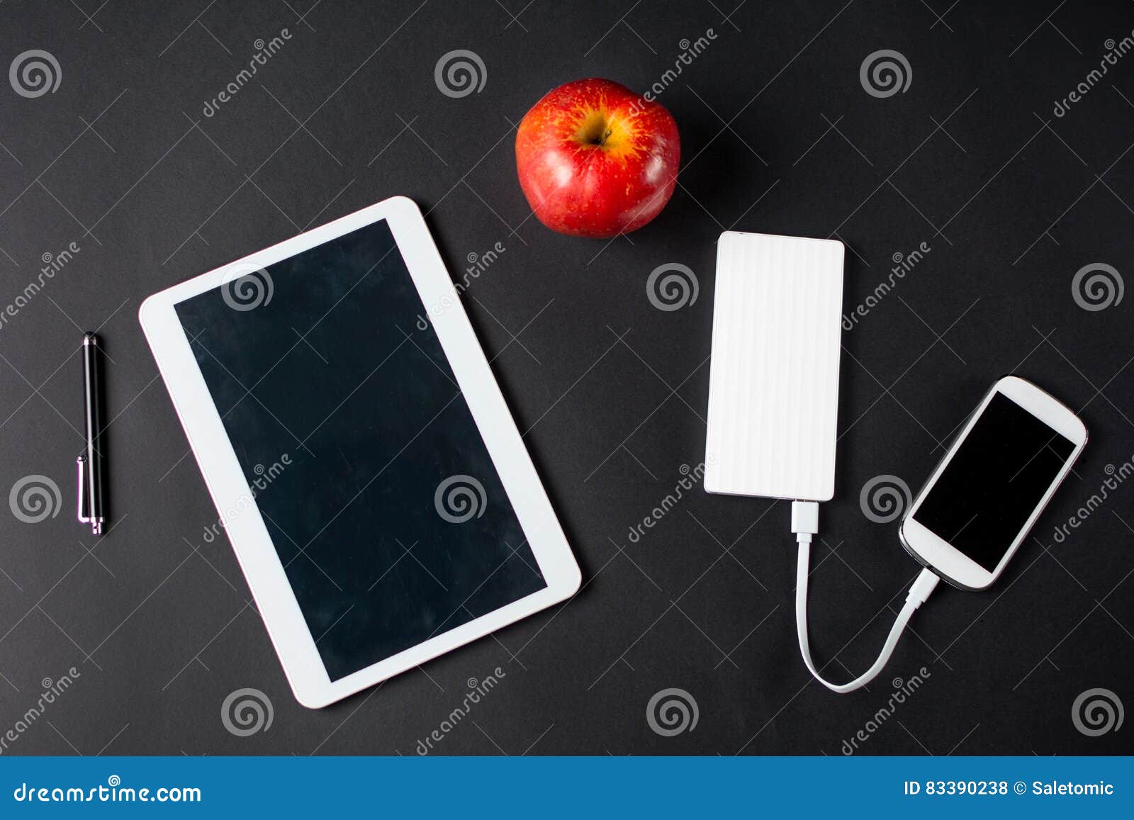 Red Apple and White Electronic Devices Stock Photo - Image of battery ...