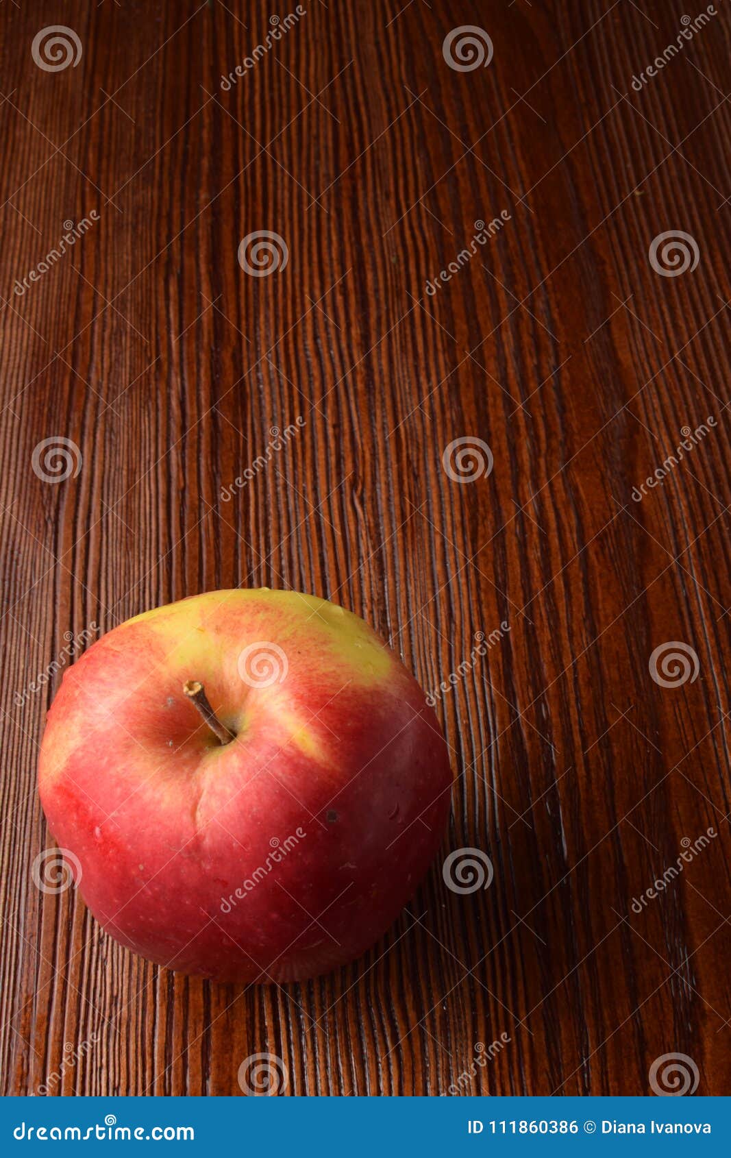 Red Apple on the Wood Table Stock Photo - Image of natural, leaves ...