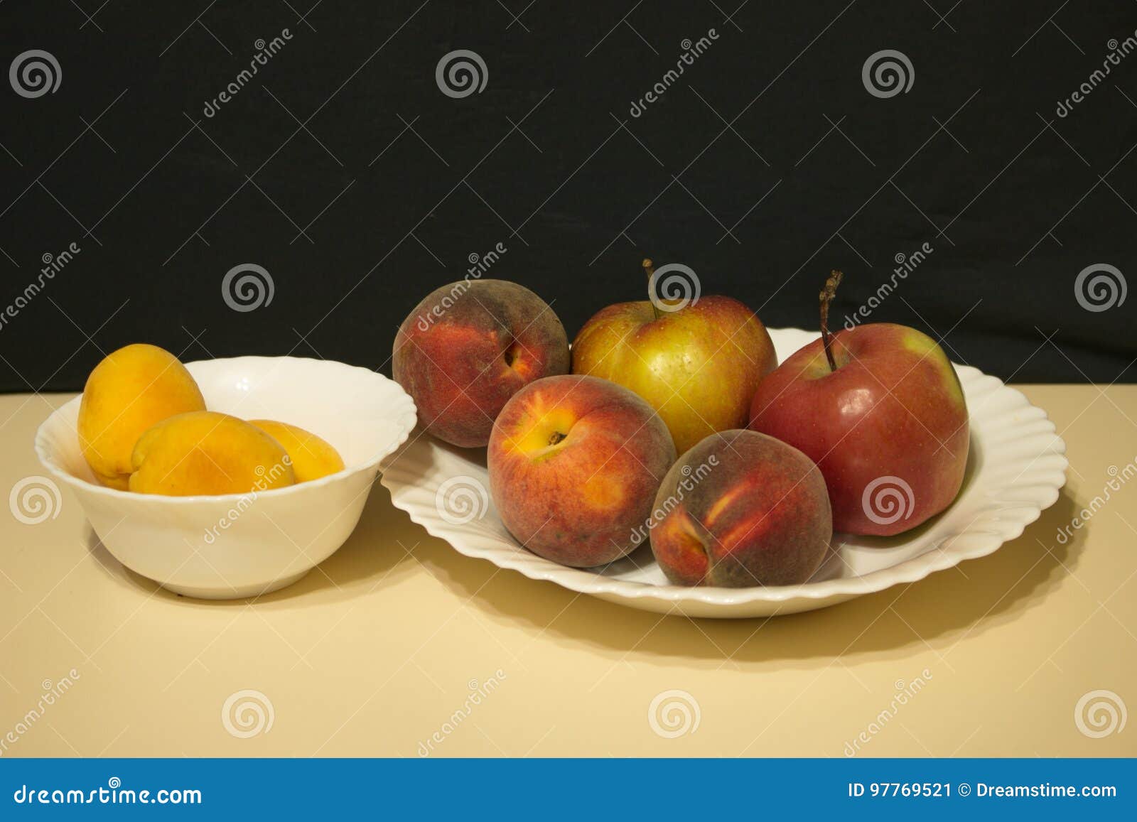 Red apples and peaches stock image. Image of fruit, desk - 97769521