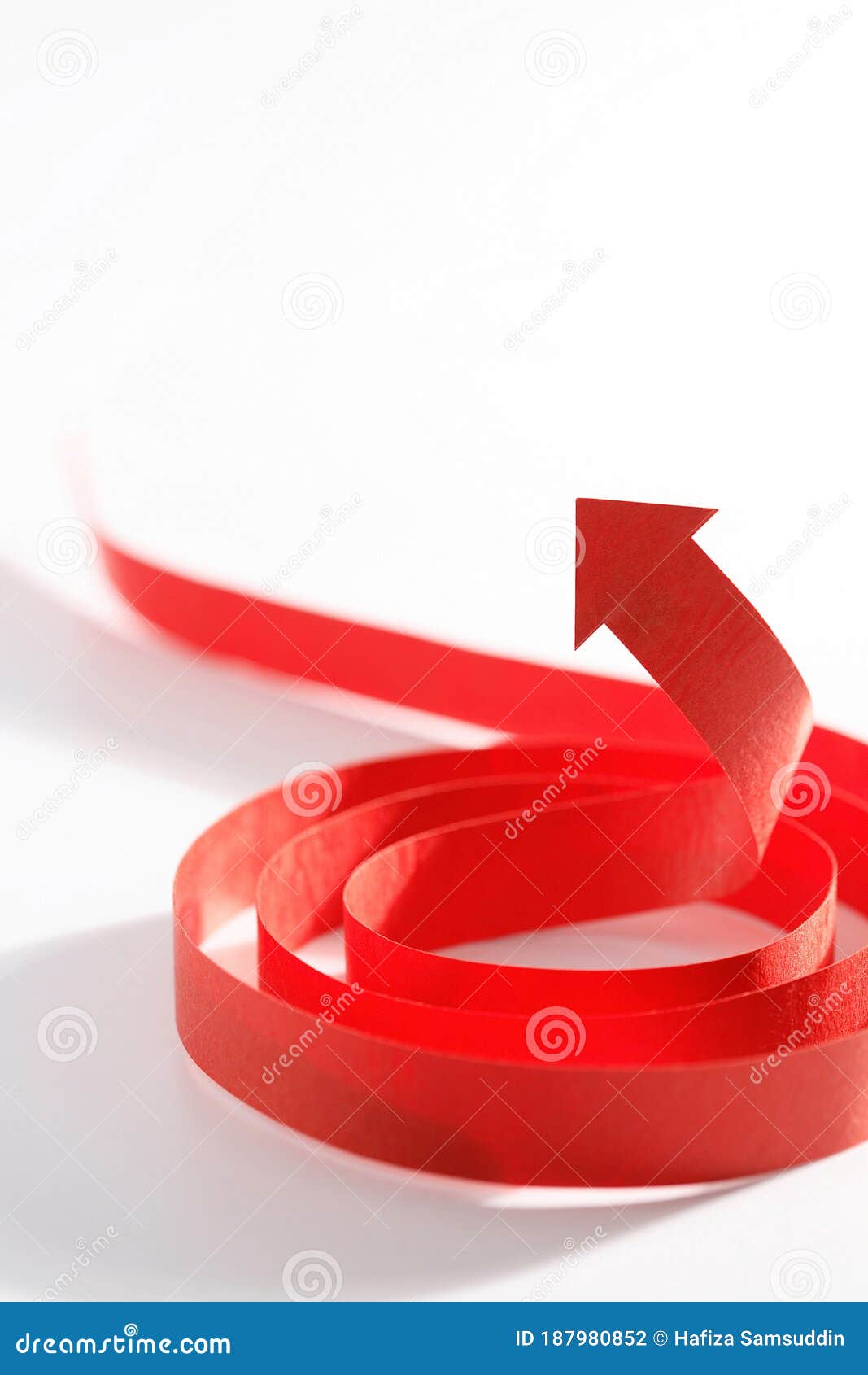 Red Arrow Coiled Up. Conceptual Image Stock Photo - Image of indoors ...