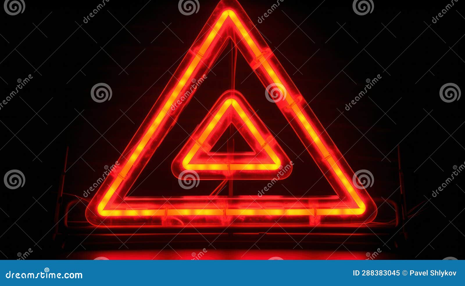 Red Automotive Safety Triangle in Perspective Glowing on a Dark ...