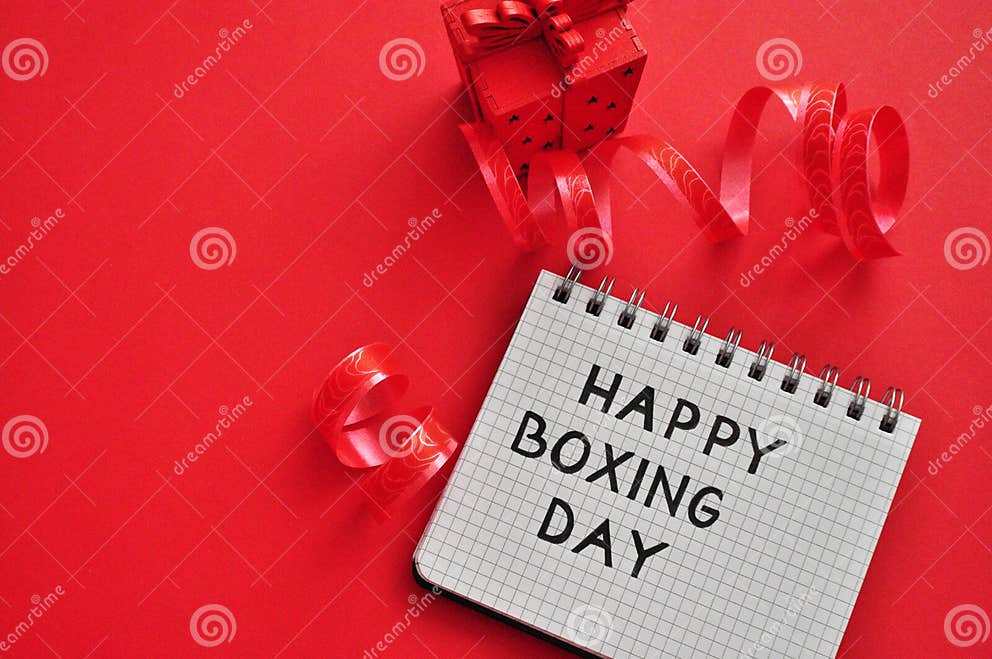 Red Background with Notebook with Happy Boxing Day Write Stock Photo ...