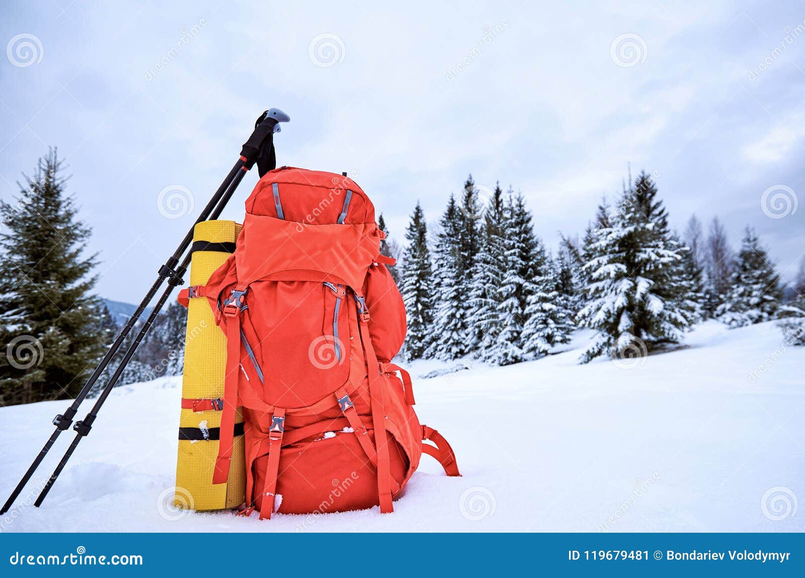 A Red Backpack on the Snow in a Winter Campaign Against the Back Stock ...