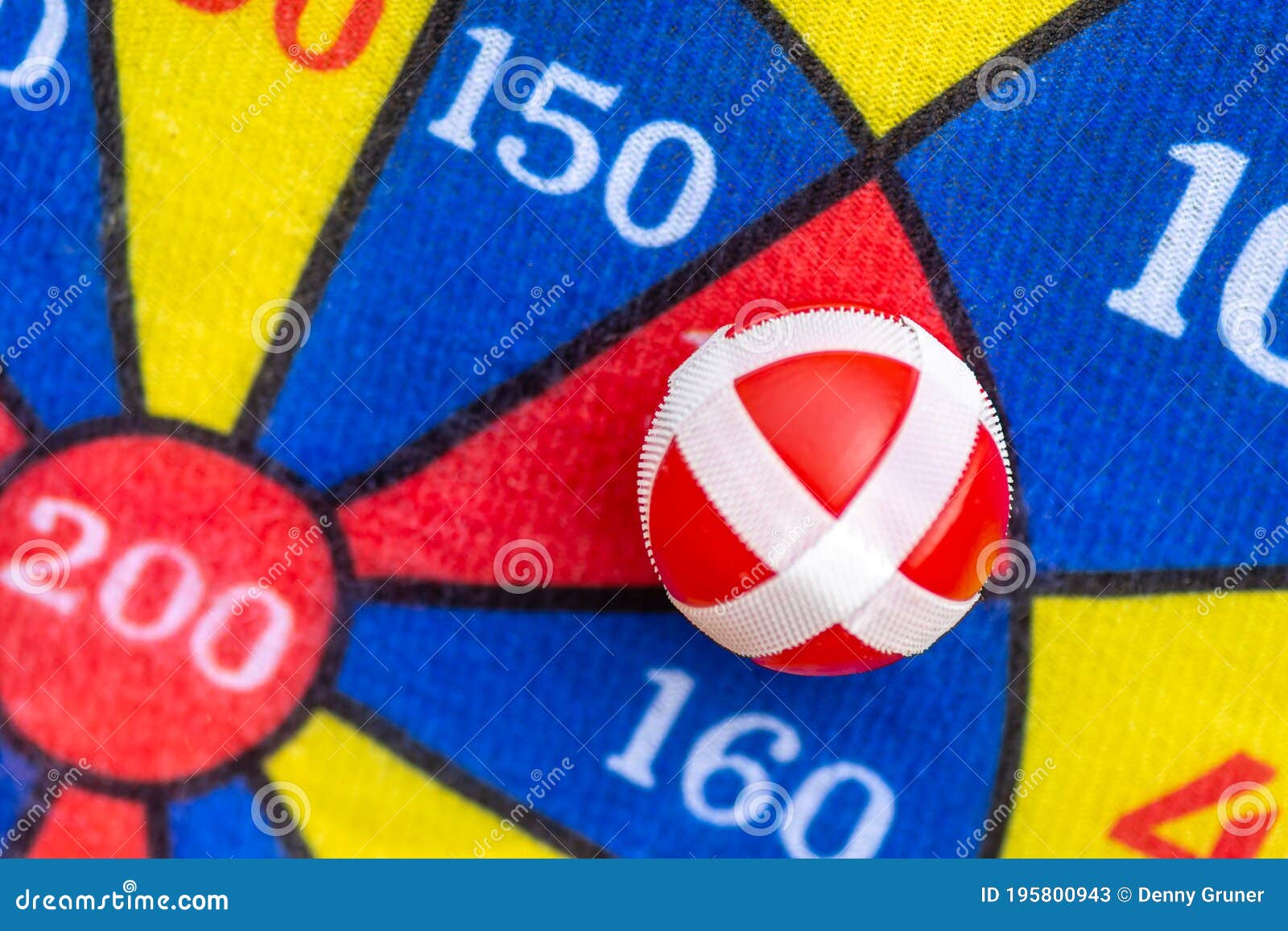 Red Ball Placed on a Colorful Kids Target Stock Image - Image of ...