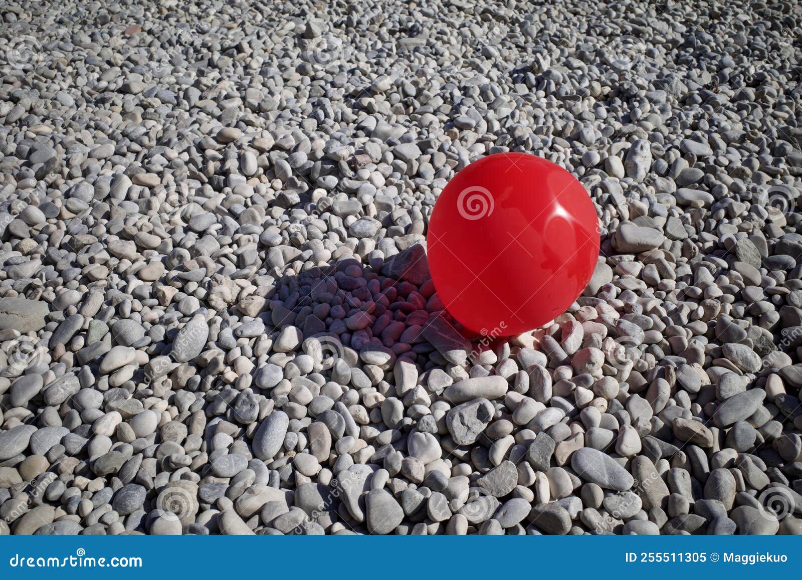 One red ballon on pebbles stock image. Image of lies - 255511305