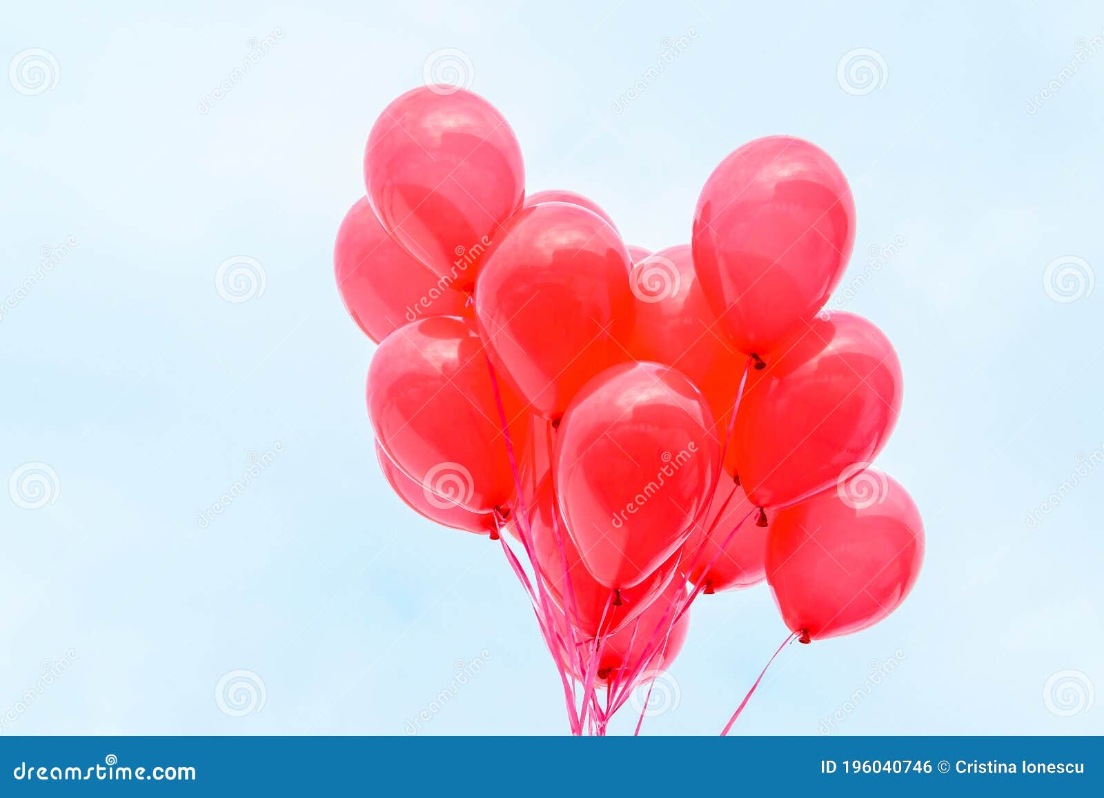 Red Balloons Towards a Light Blue Sky, Flying in the Air Stock Photo ...