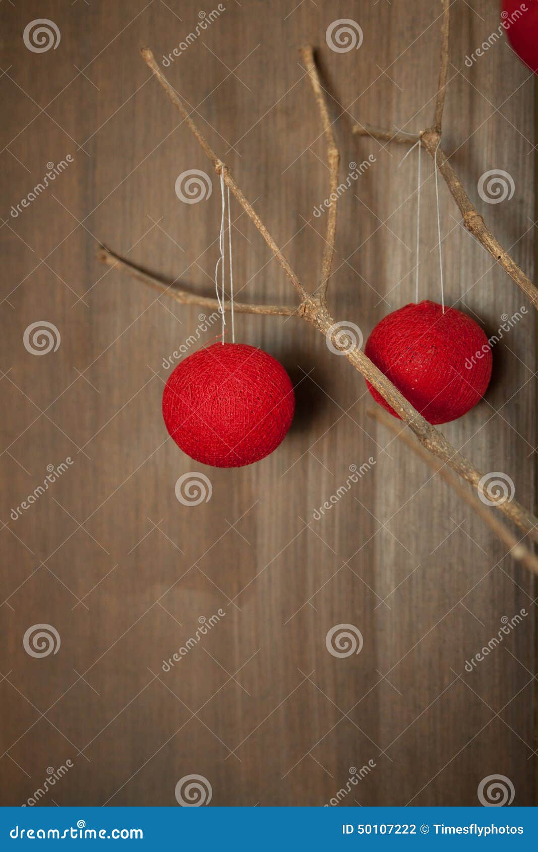 Red Balls of String on Branch on Neutral Wall Stock Photo - Image of ...