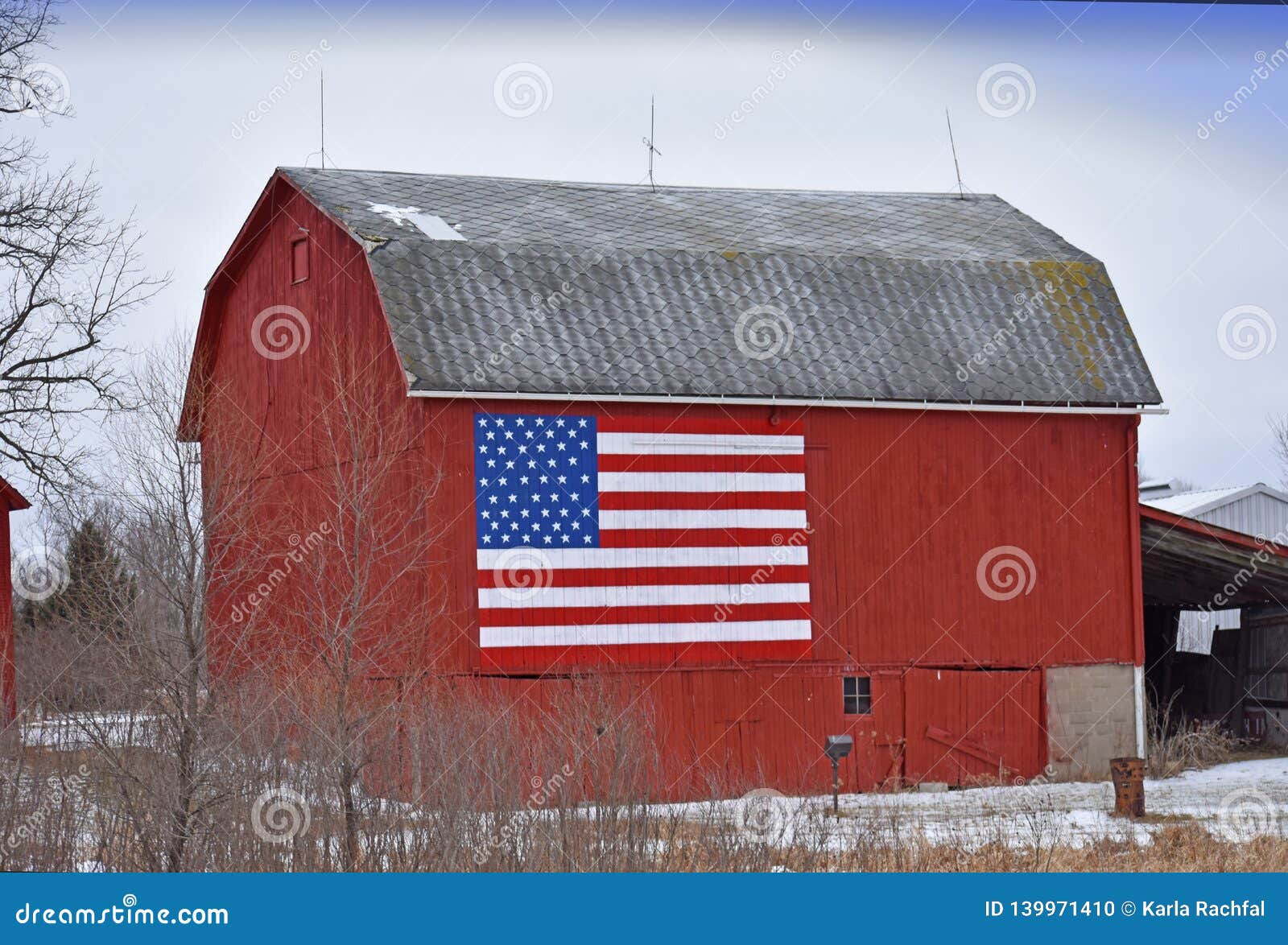 Red Barn with American Flag Stock Photo - Image of patriotic, county ...