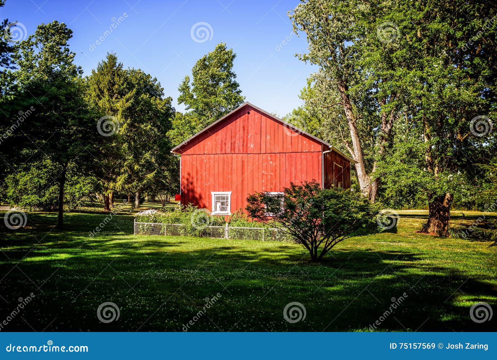 Red Barn with Fenced in Garden Stock Image - Image of barn, cultivated ...