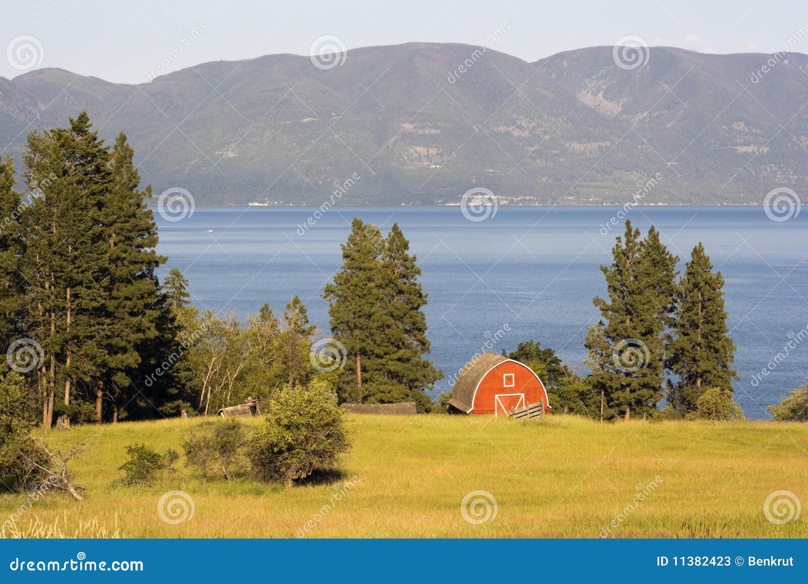 Red Barn by the Lake stock image. Image of morning, mountains - 11382423