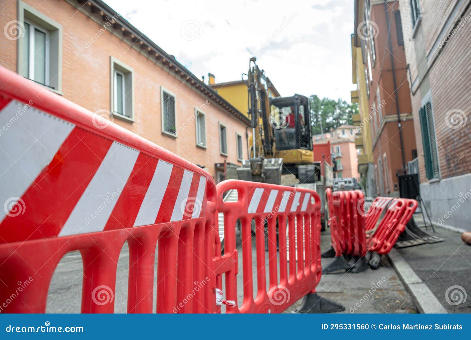 Red Barriers Marked As Safety in Construction Work with Excavator in ...