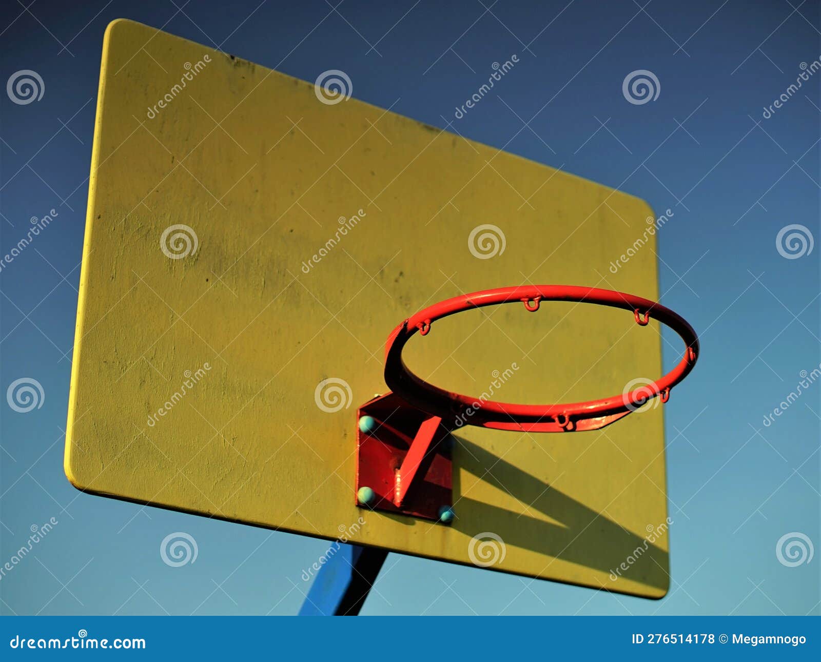 Red Basketball Hoop on Yellow Board in Deep Blue Sky at Sunset Stock ...