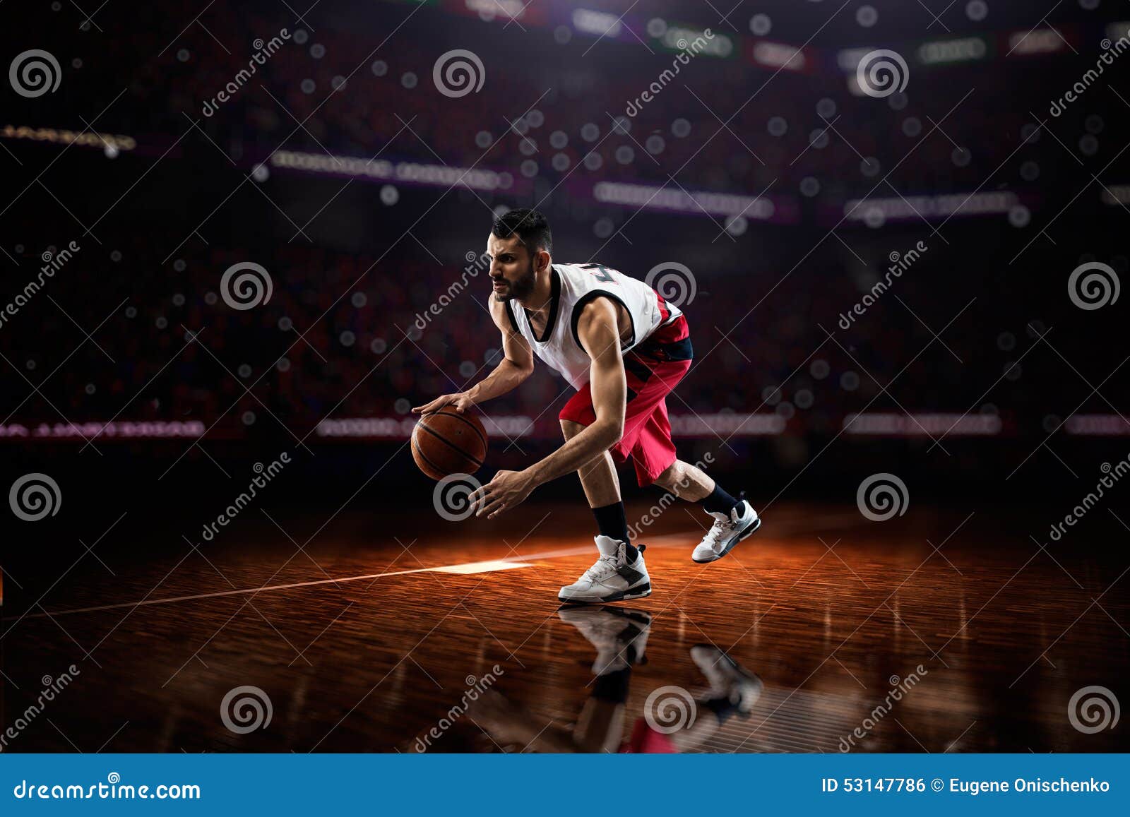 Red Basketball Player in Action Stock Photo - Image of hoop, light ...
