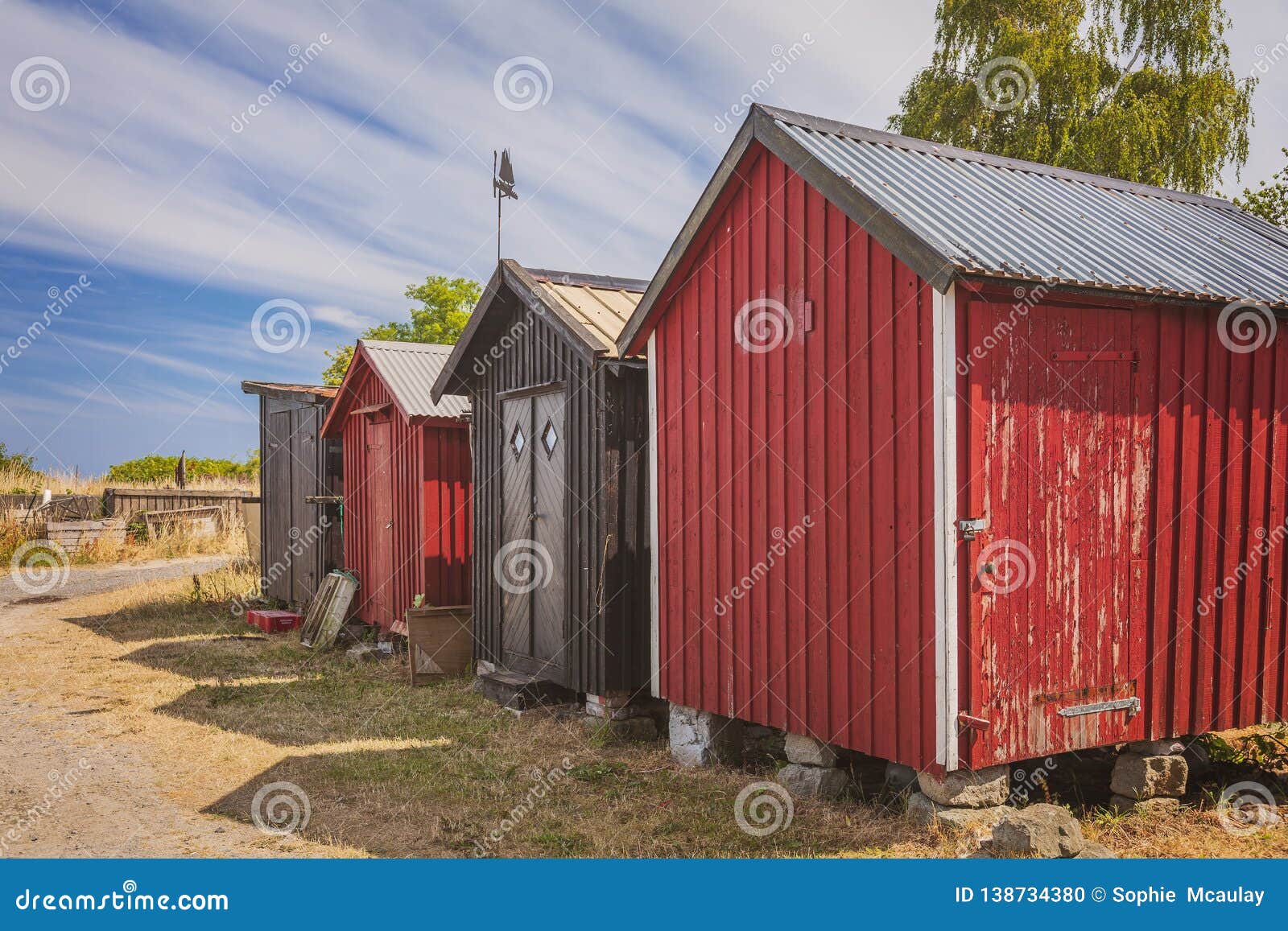 Red beach huts stock photo. Image of landscape, house - 138734380