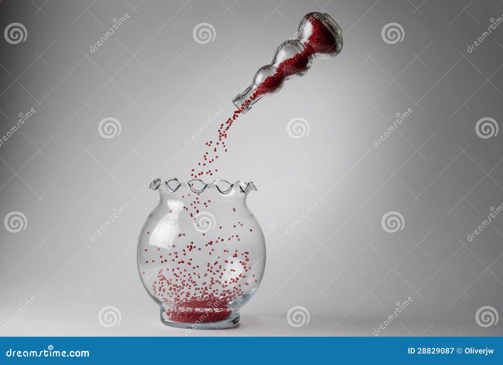 Red Beads Falling into Glass Vase Stock Image - Image of large ...