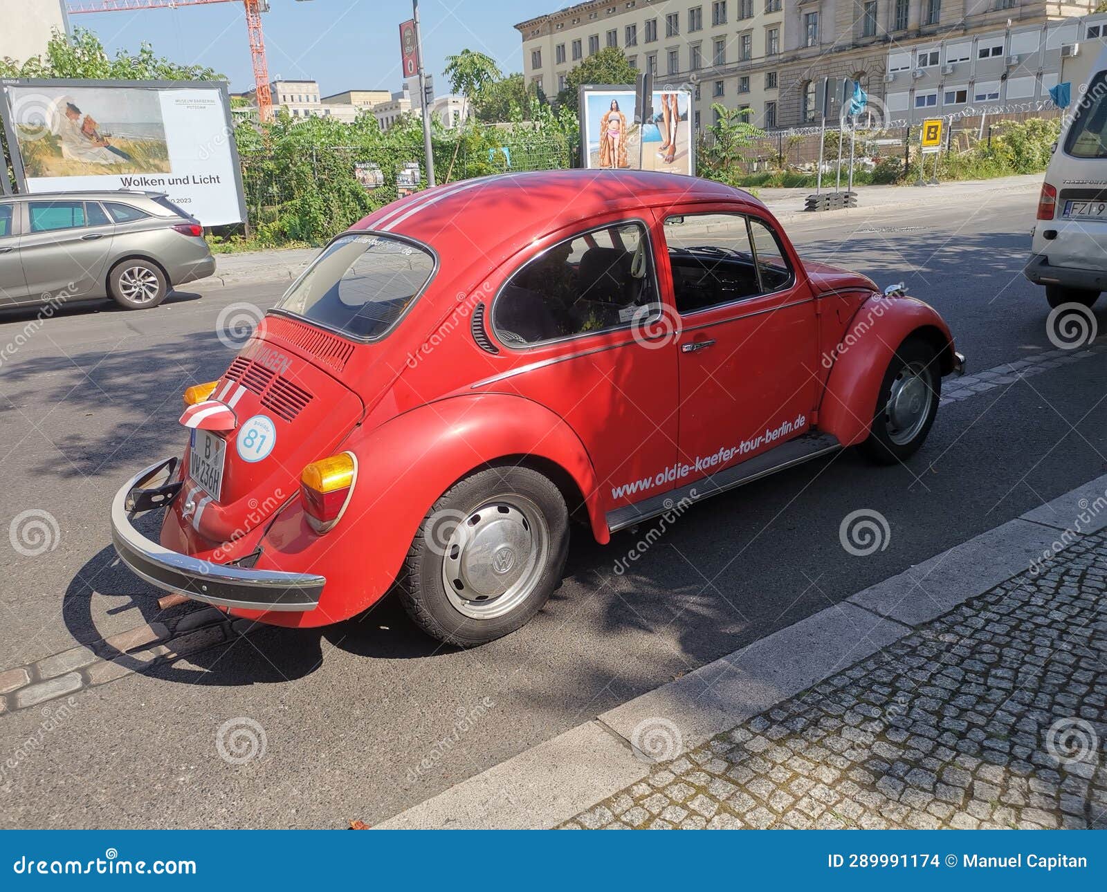 Red beetle car in Berlin editorial stock image. Image of berlin - 289991174