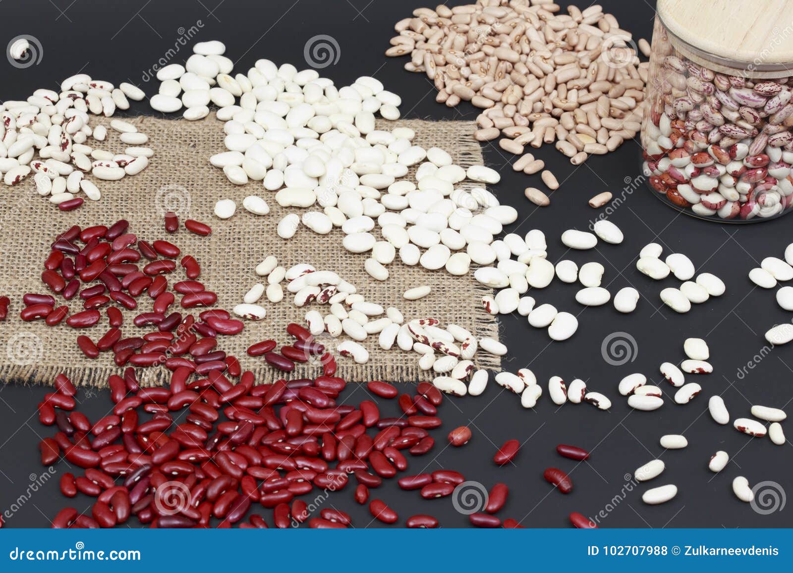Multicolored Beans are Scattered on a Gray Background. Stock Photo ...