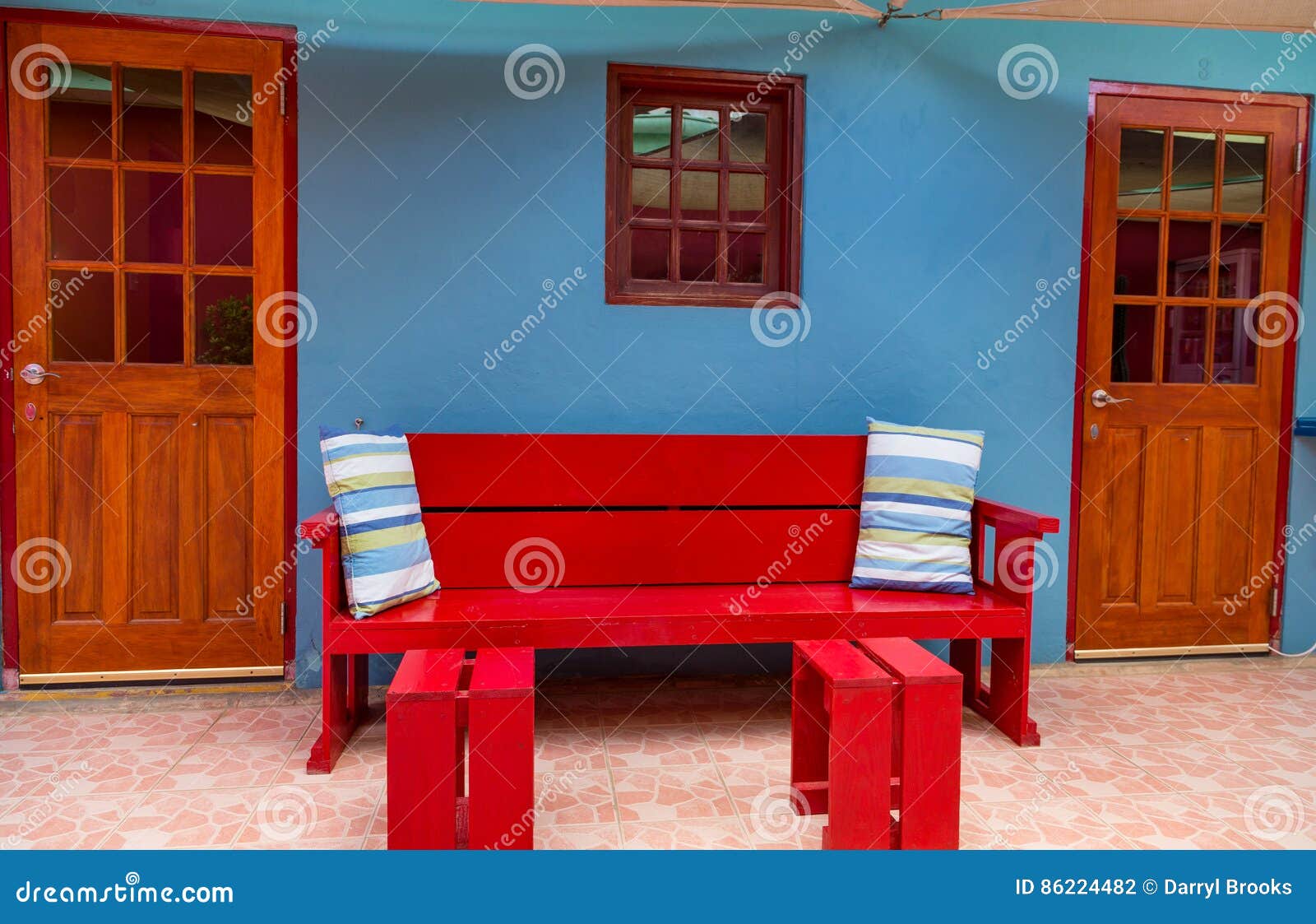 Red Bench on Blue Wall stock photo. Image of building - 86224482