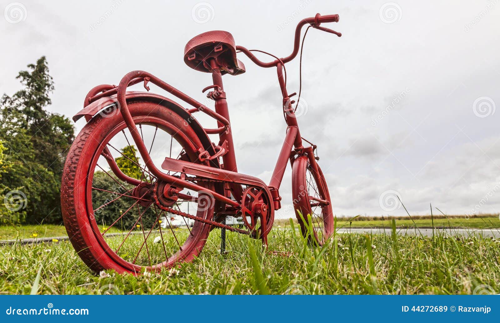 Red Bicycle on the Roadside Stock Image - Image of sport, road: 44272689