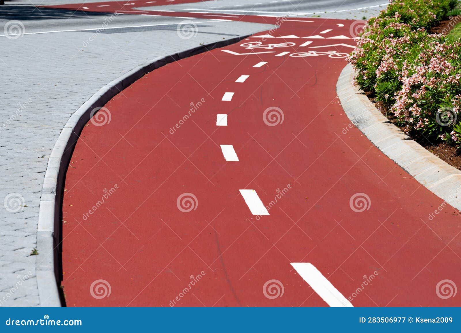 Red bike path in Funchal stock image. Image of sign - 283506977