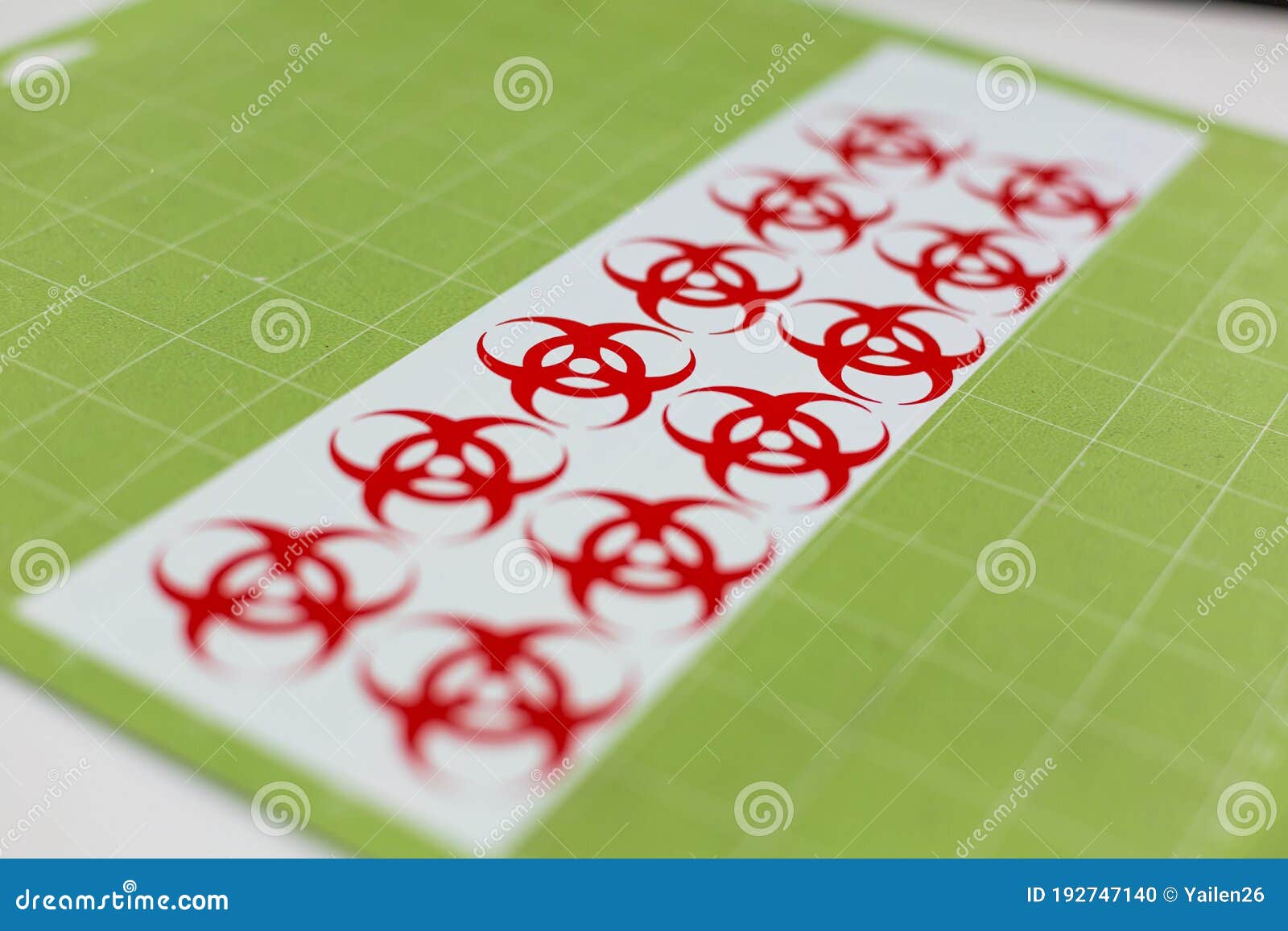 Red Biohazard Vinyl Stickers on Green Matt Made Using a Cutting Machine ...