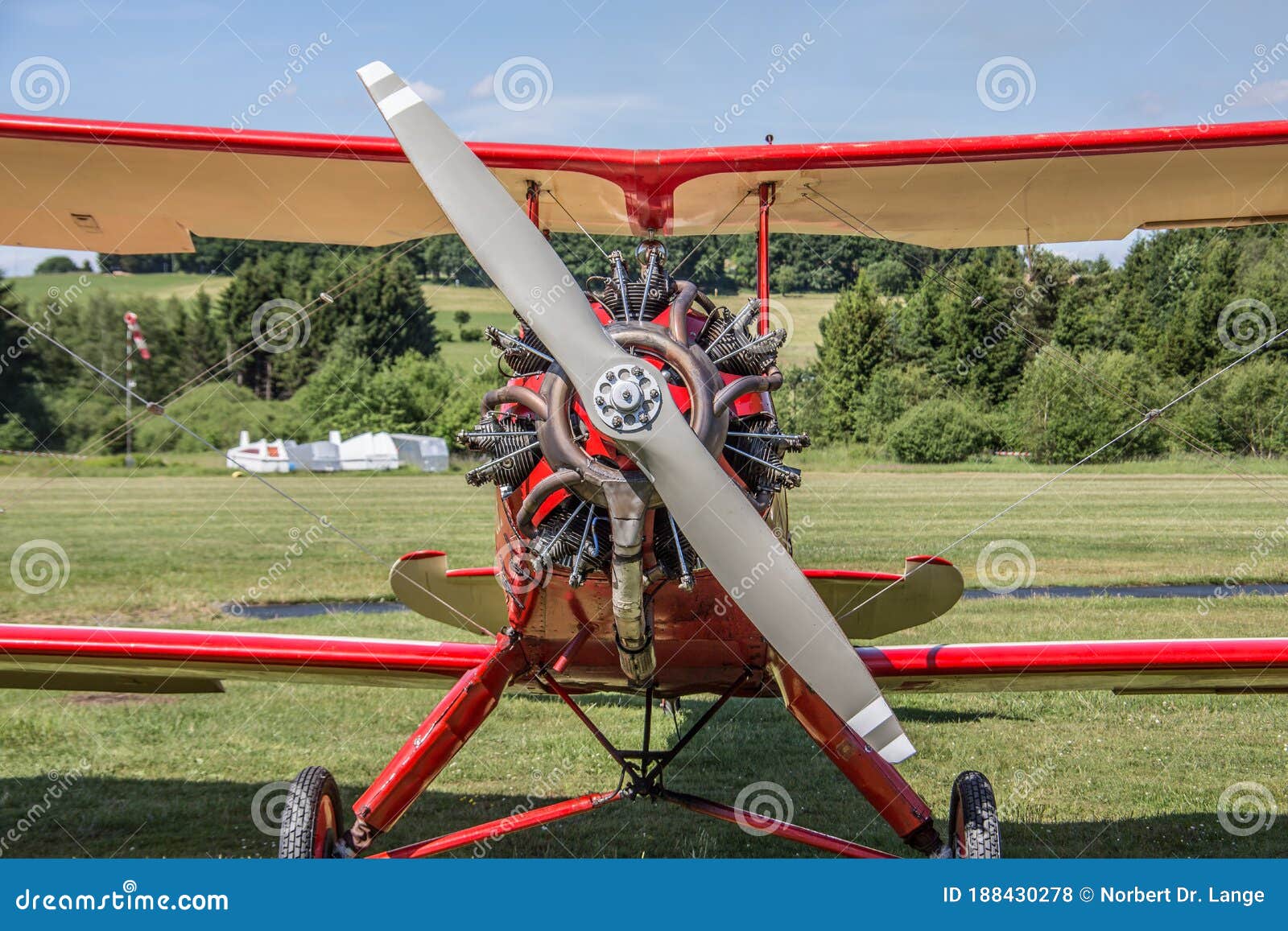 Red Biplane Airplane on Meadow Stock Photo - Image of green, brown ...