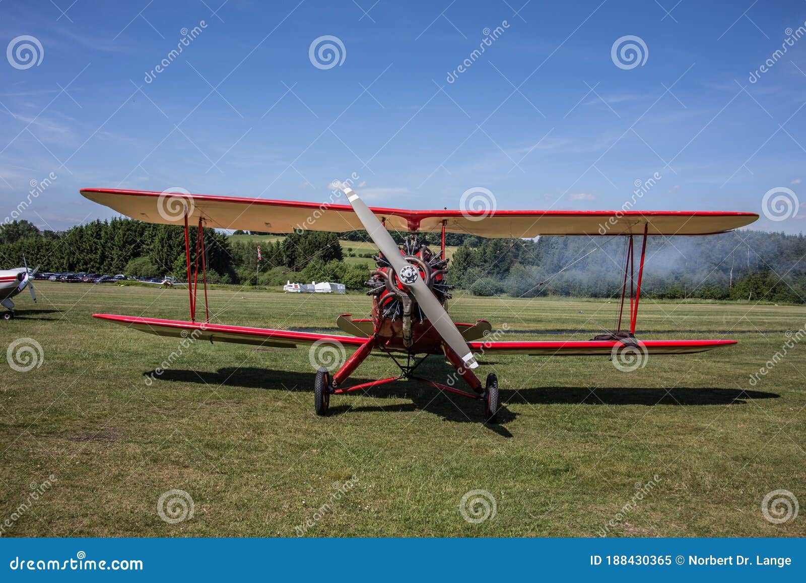 Red Biplane Airplane on Meadow Stock Image - Image of runway, nsborn ...