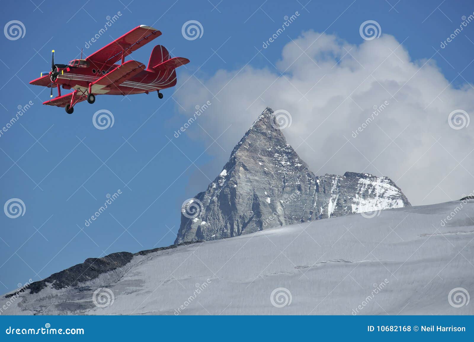 Red Biplane Over the Matterhorn Stock Photo - Image of plane, plateau ...