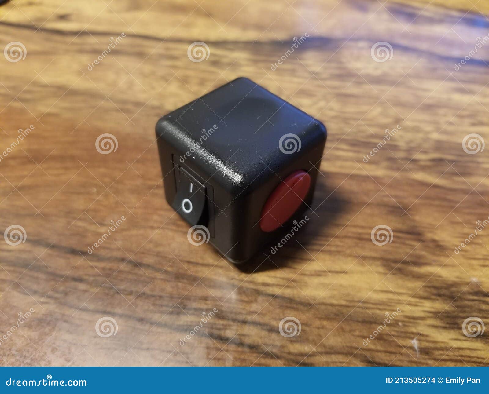 Red and Black Fidget Cube Sitting on a Table Stock Photo - Image of ...