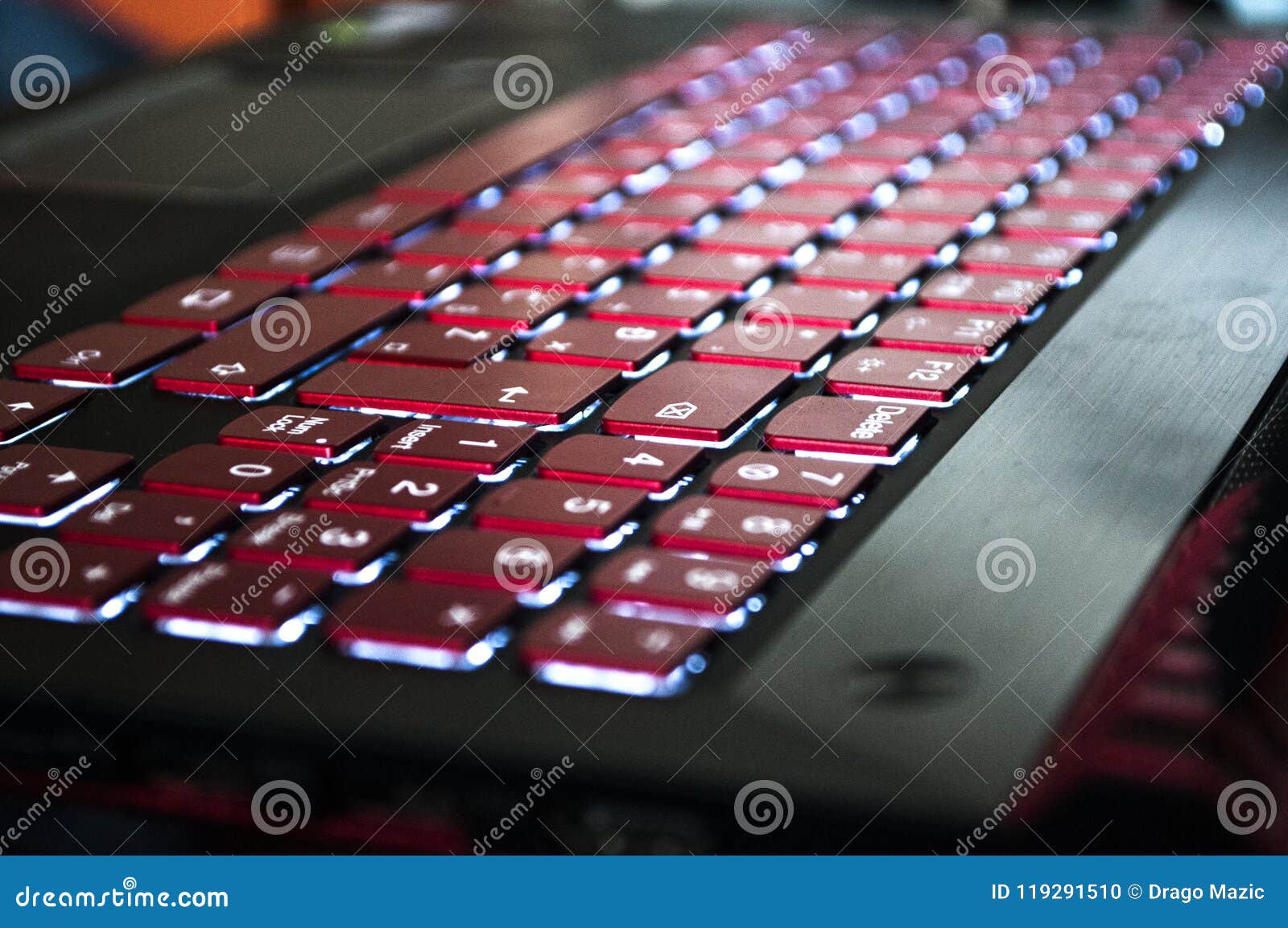 A red-black gaming laptop stock photo. Image of backlit - 119291510