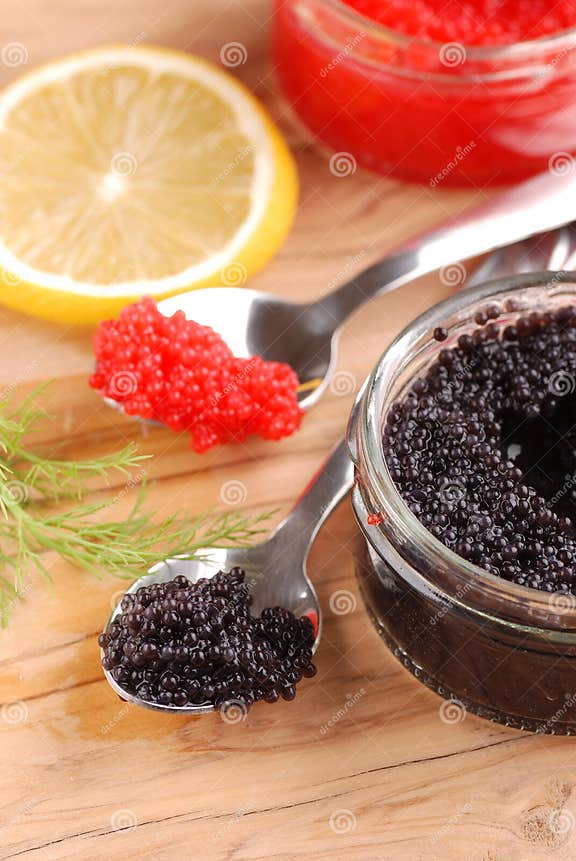 Red and black lumpfish roe stock photo. Image of glass - 26330626