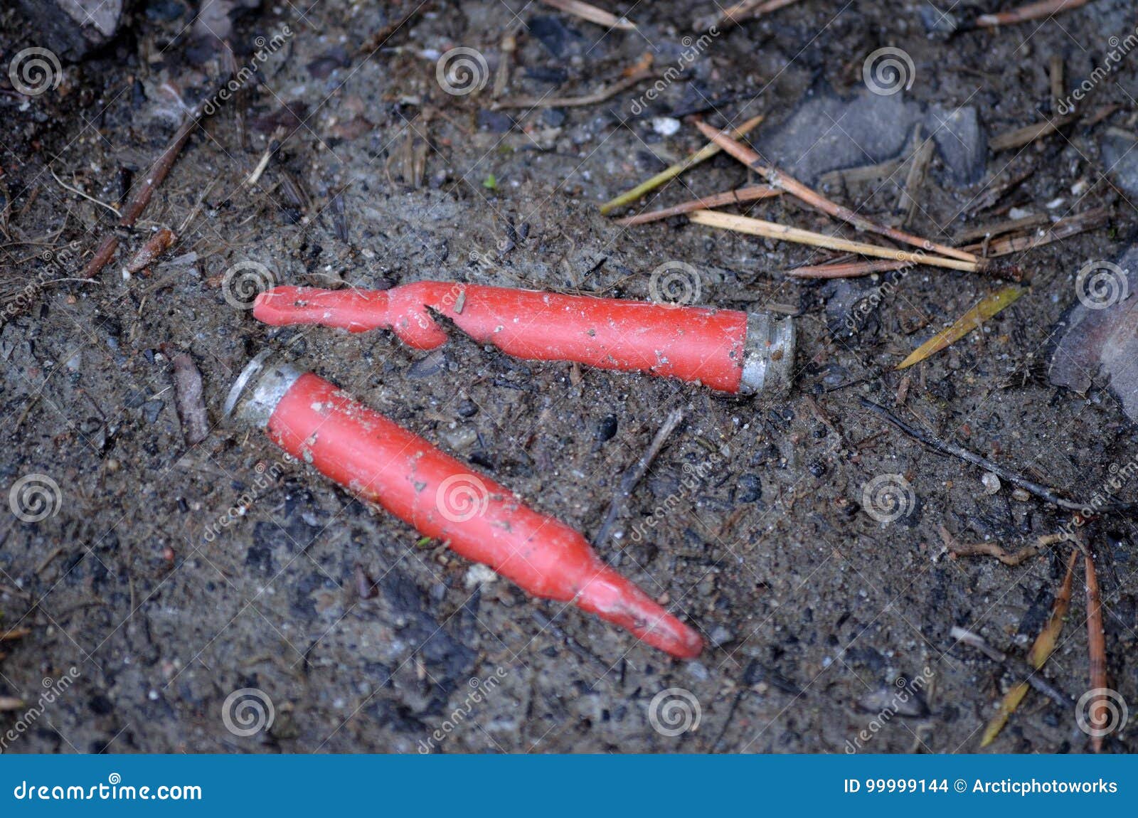 Red Blank Training Ammunition on Ground Stock Photo - Image of shoot ...