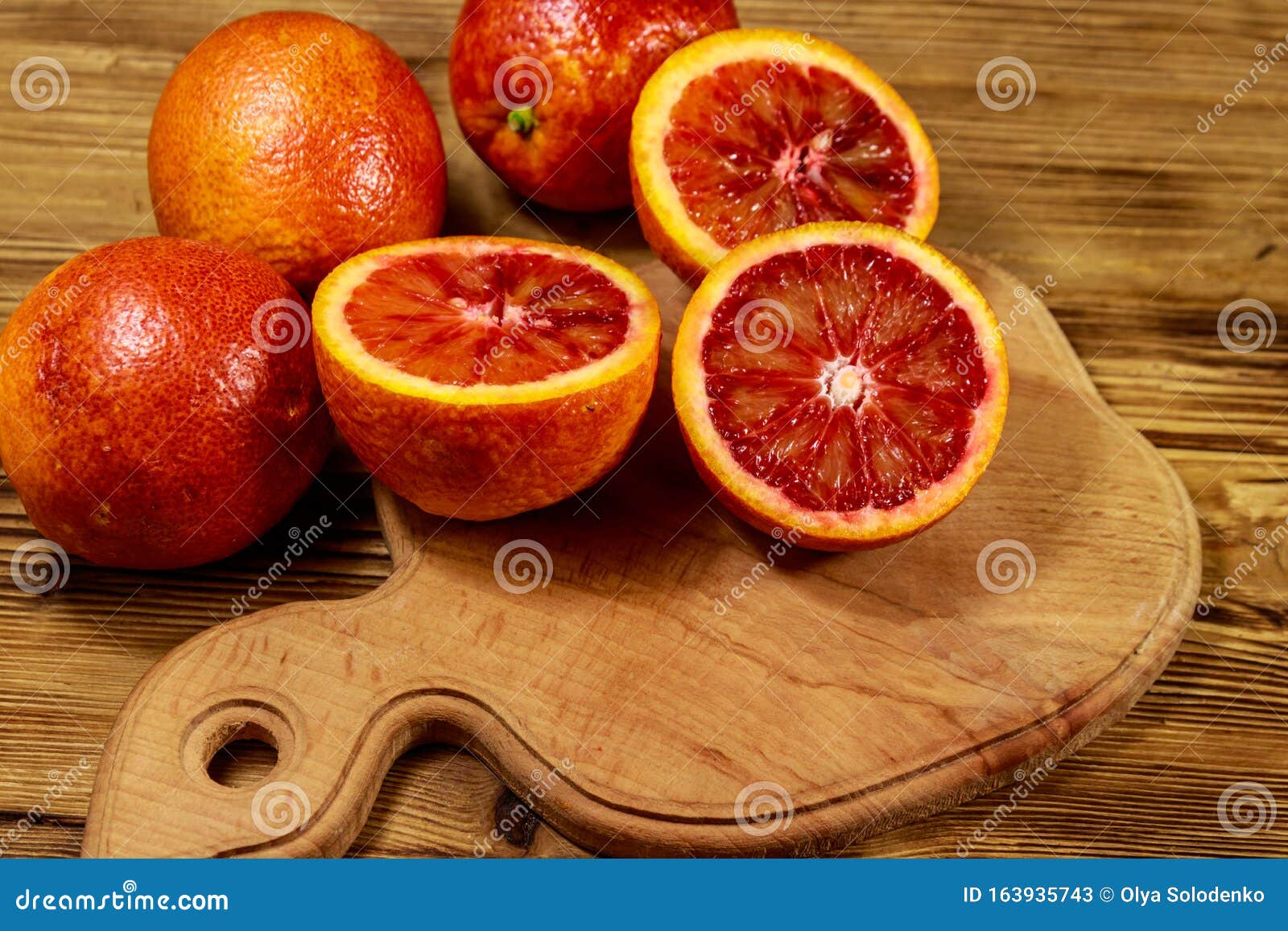 Red Blood Oranges on Wooden Table Stock Image - Image of ripe, fresh ...