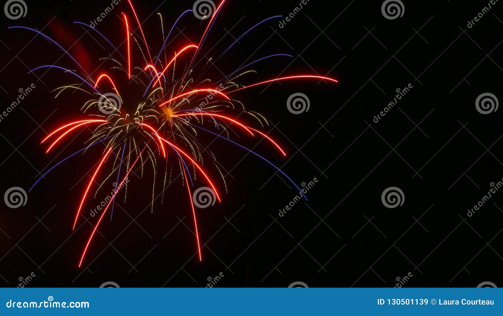 Red and Blue Arcs with Gold Arcs in Center Firework during the Fourth ...