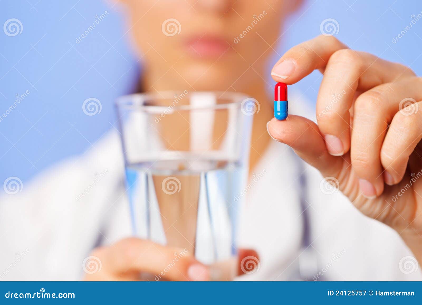 Red and Blue Bolus (capsule) in Doctor Hand Stock Image - Image of ...