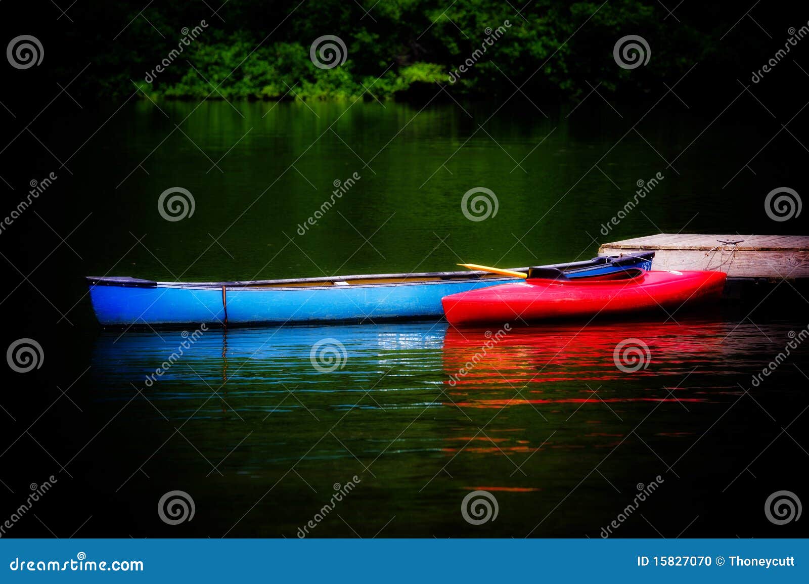 Red and Blue Canoe stock photo. Image of fishing, canoe - 15827070