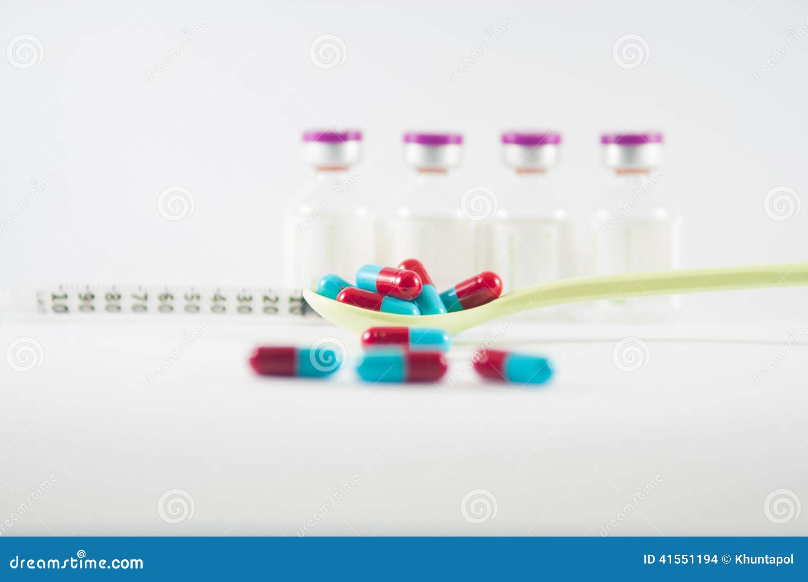 Red and Blue Capsule Show Medicine Concept Stock Photo - Image of spoon ...