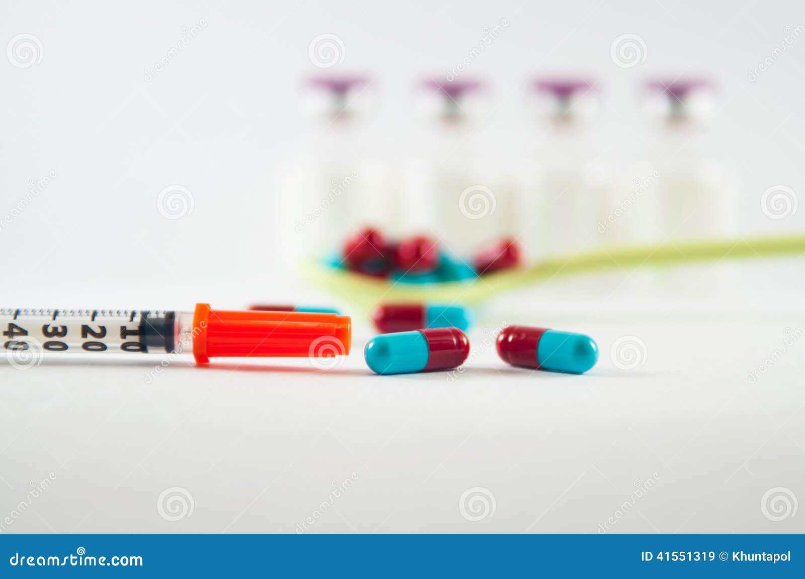 Red and Blue Capsule and Syringe Show Medicine Concept Stock Image ...