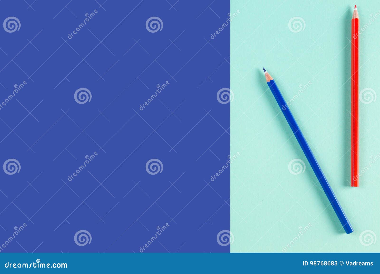 Red and Blue Colored Pencils on Blue Color Background Stock Image ...