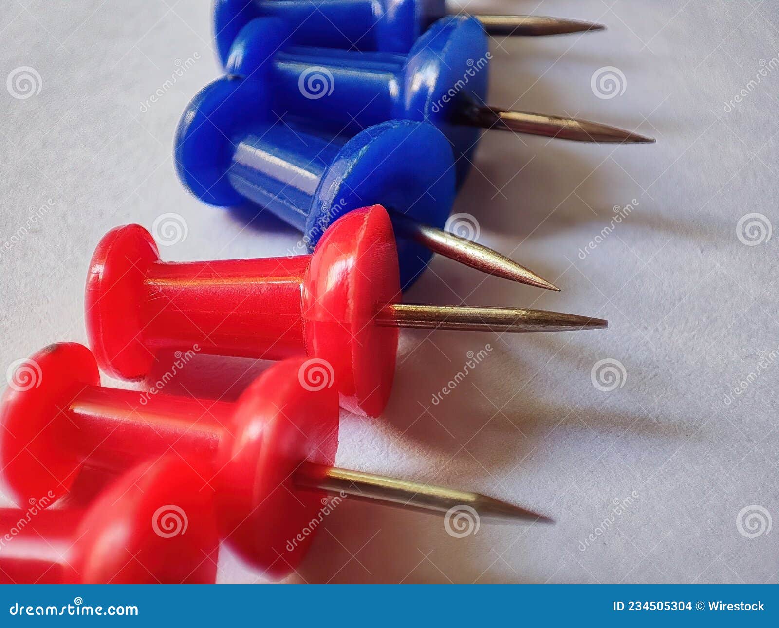 Red and Blue Drawing Pins on White Background Stock Photo - Image of ...