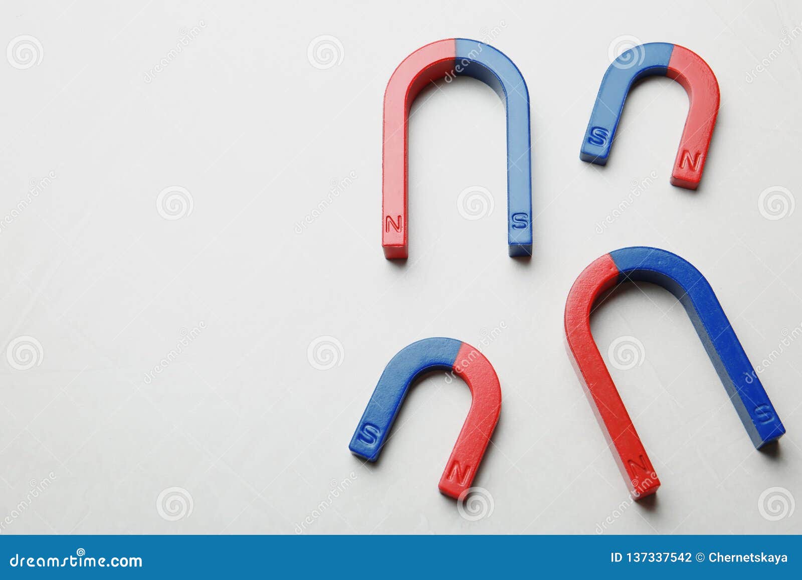 Red and Blue Horseshoe Magnets on White Background Stock Photo - Image ...