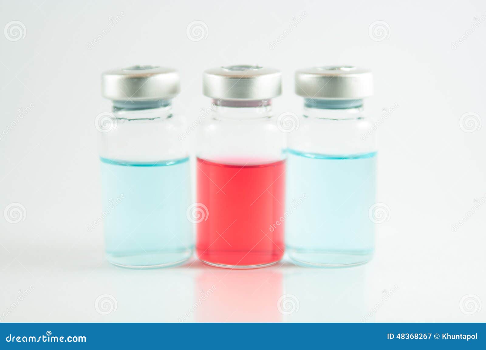 Red and Blue Liquid in Injection Vials Stock Image - Image of ...