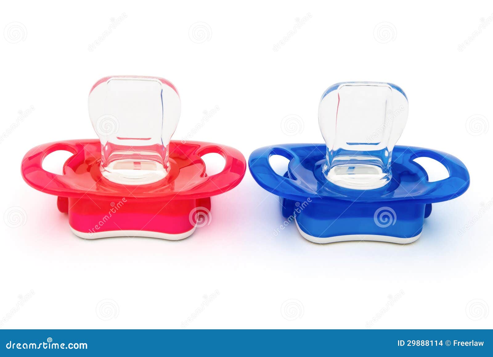 Red and blue pacifiers stock photo. Image of infant, reassure - 29888114