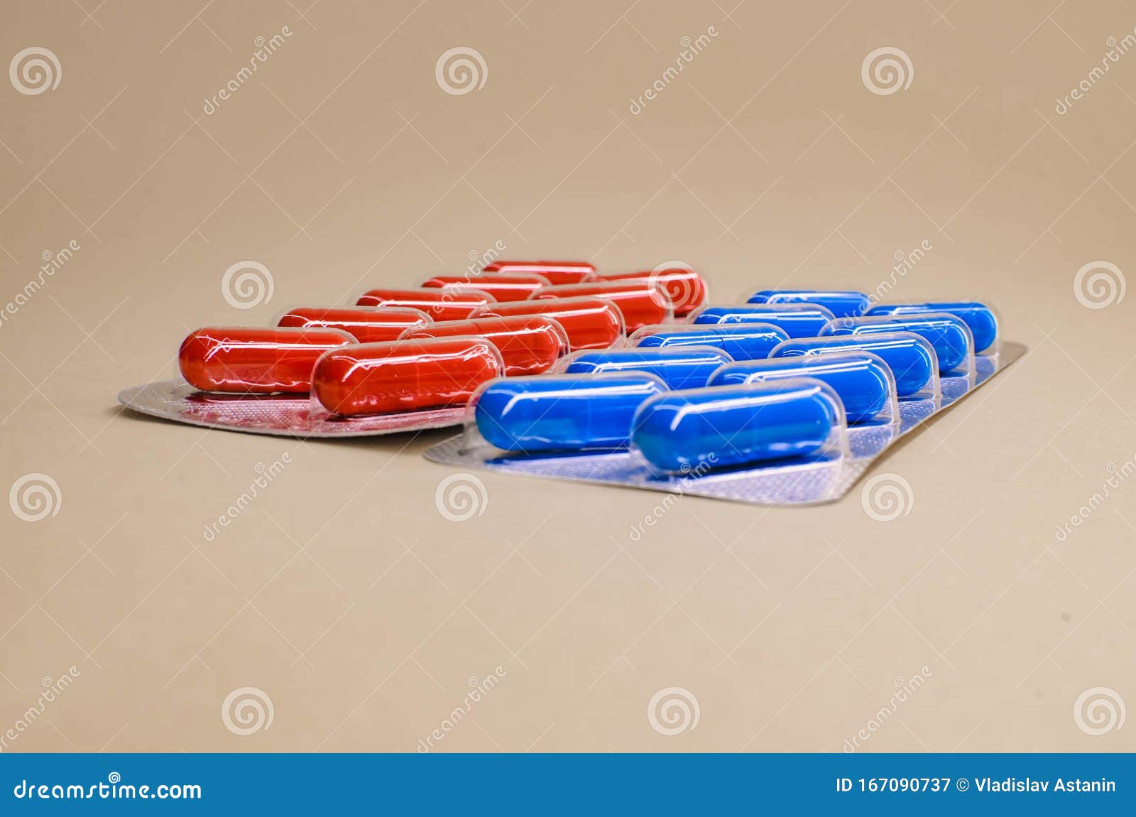 Red and Blue Pill Boxes on Beige Background Stock Image - Image of care ...