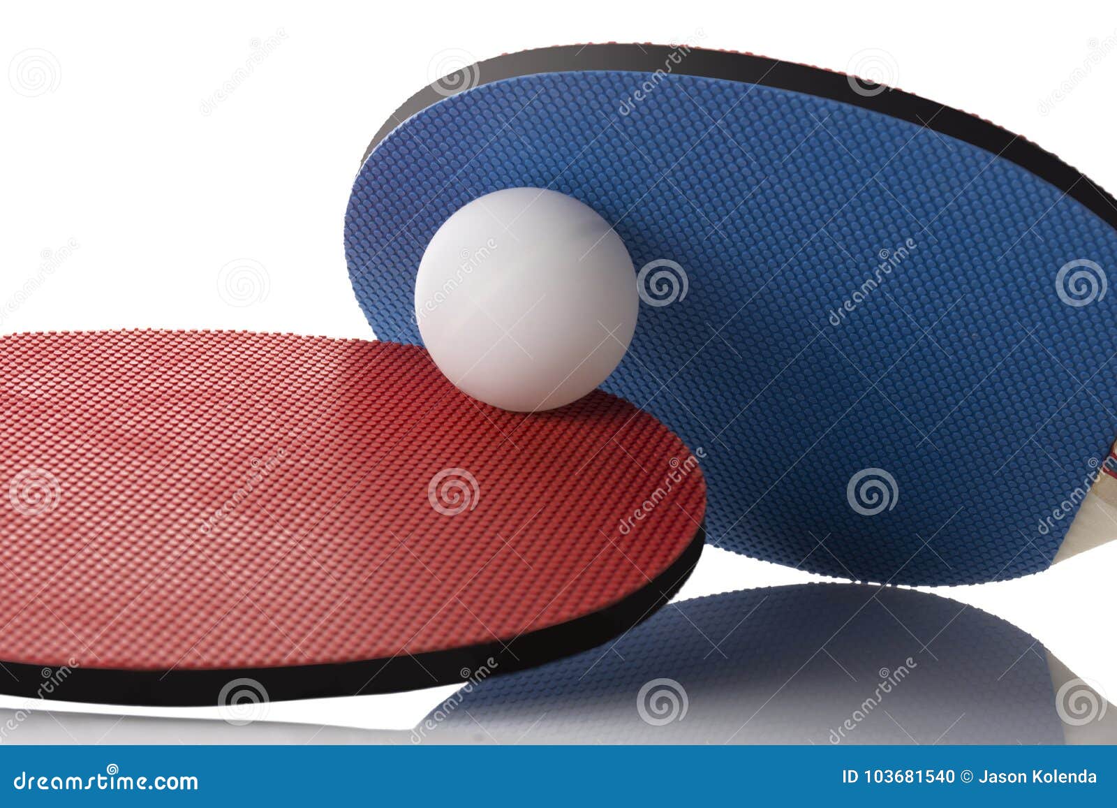 Red and Blue Ping Pong Paddles - Ball in between Stock Photo - Image of ...