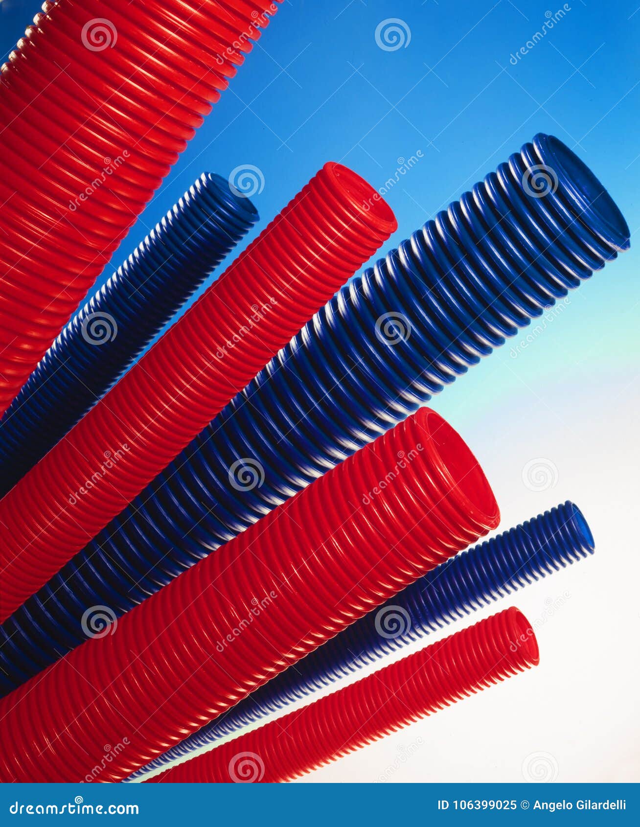 Red and blue plastic tubes stock image. Image of production - 106399025