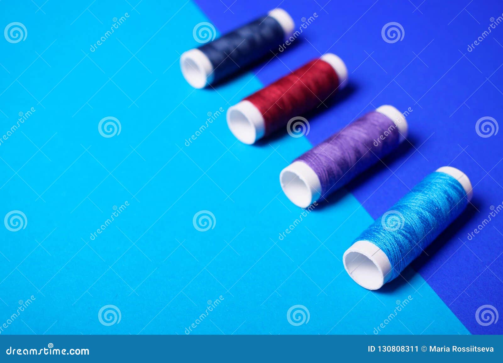 Red and Blue Sewing Threads. Stock Image - Image of dressmaking ...